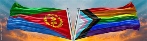 Eritrea Flag And New LGBT Flag Waving With Texture Blue Sky Could Sunset Double Flag Stock Photo