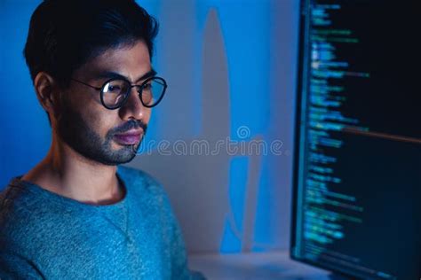 Indian Software Development Working On Coding Computer Screen And Flowchart At Night In Modern