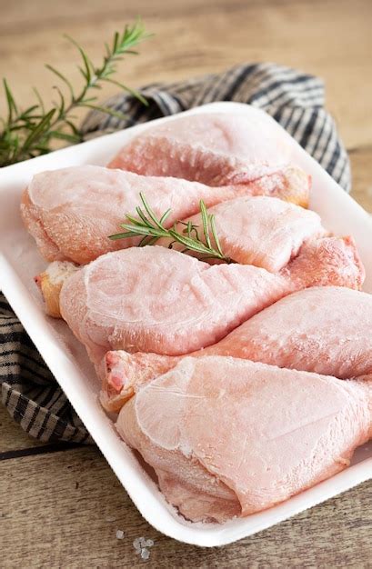 Premium Photo Frozen Chicken Thighs In A Styrofoam