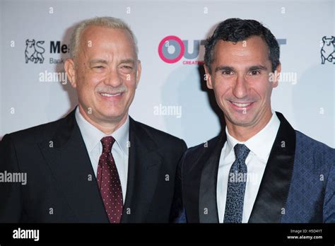 Actor Tom Hanks L And Tommaso De Vecchi Louis Vuittons Senior Vice President Of The Western