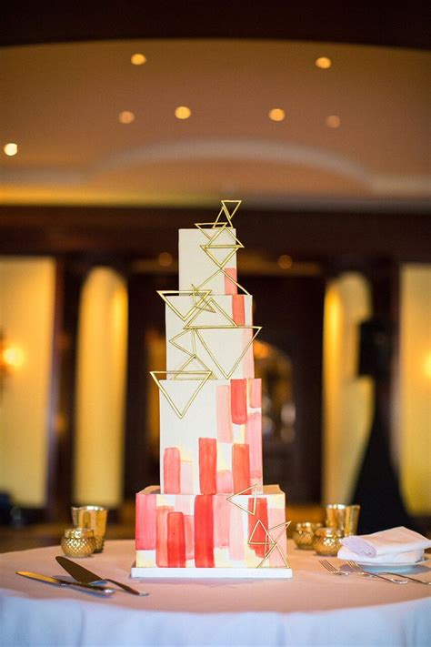 Geometric Wedding Cake With Modern Metal Gold Shapes Pink And White