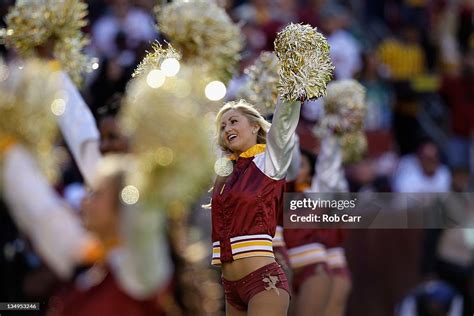 A Washington Redskins Cheerleader Preforms During The Second Half Of