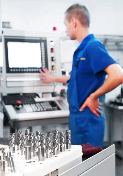 ᐈ Cnc machine operator stock photos Royalty Free cnc machine operator pictures photos