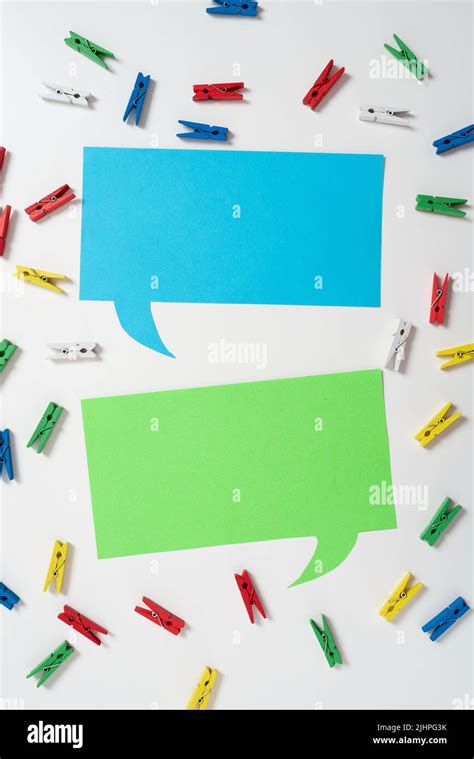 Pegs Placed Around Two Speech Bubbles With Important Information