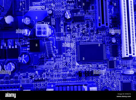 Integrated Semiconductor Microchip On Blue Circuit Board Representative Of The High Tech