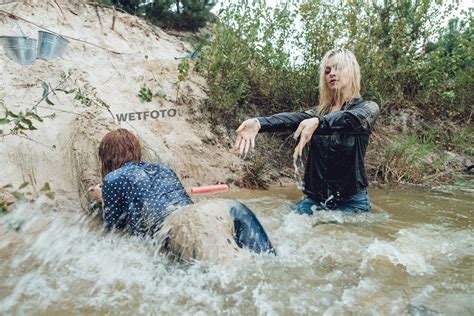 Water Games With Two Girls In Completely Wet Clothes