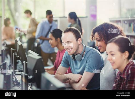 College Students Using Computers In Computer Lab Library Stock Photo Alamy