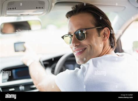 Smiling Man Using Satellite Navigation System Stock Photo Alamy