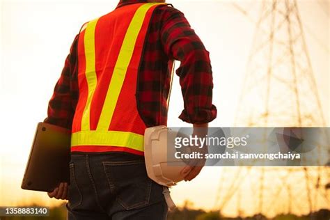 Engineers Wear High Telecommunication Monitoring Safety Devices To Maintain 5g Networks Working Engineers Wear High Telecommunication Monitoring Safety Devices To Maintain 5g Networks Working