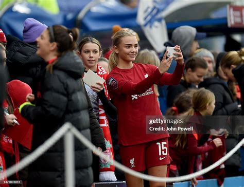 Sofie Lundgaard of Liverpool Women taking a selfie with fans after... News Photo - Getty Images