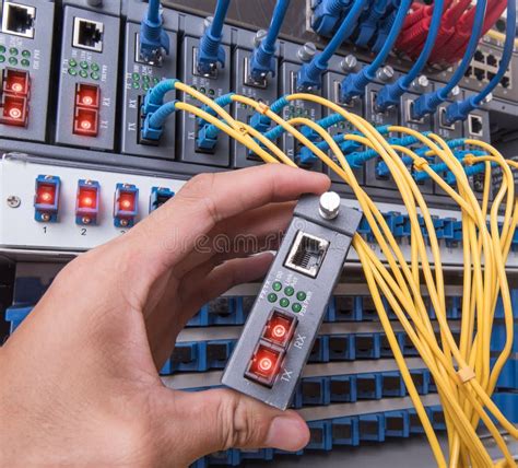 Man Connecting Fiber Network Cables Stock Photo Image Of Center Electronic