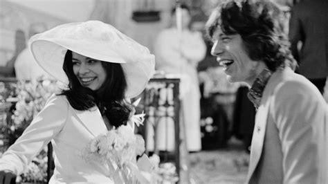 The Story Behind Bianca Jaggers Iconic Wedding Suit And Dua Lipas