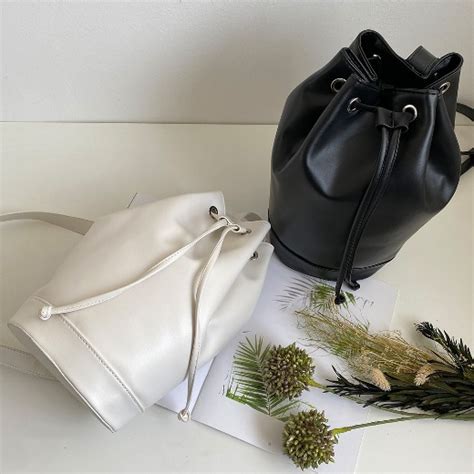 조임끈 복조리 원형 원통 가죽 레더 버킷 숄더백