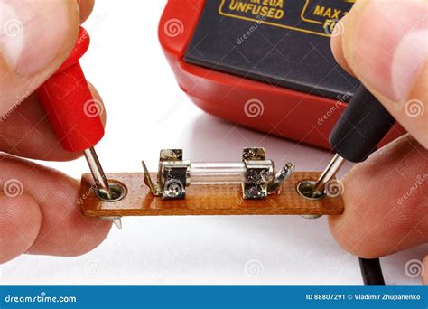 Test The Fuse With A Multimeter On A White Background Stock Image Image Of Power Probe