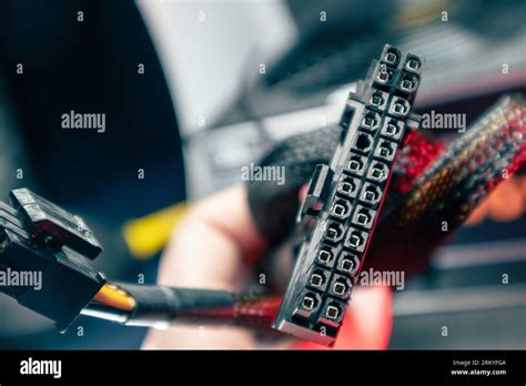 Cable Connector 24 Pin From Power Supply Unit Of Desktop Pc Close Up With Blurred Background