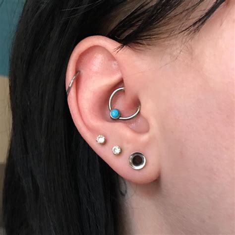 Ear Stretching Fifth Stretch 4mm 6 Gauge With A Silver Ear Tunnel