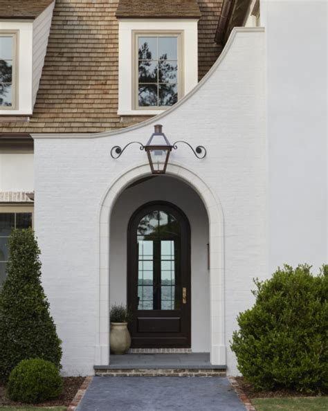 White Brick French Inspired Home In Jacksonville French Country