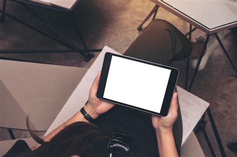 premium photo woman using mockup tablet