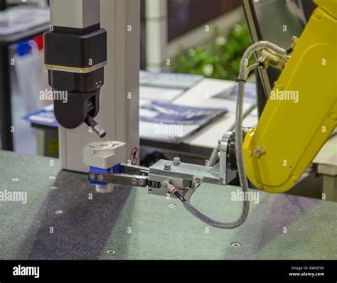 Robotic Arm Loading Workpiece To CNC CMM Coordinate Measuring Robotic Stock Photo Alamy