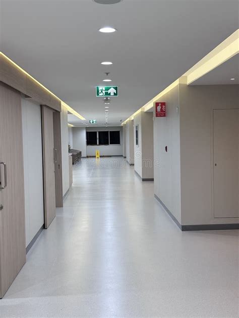 Building Emergency Exit With Exit Sign And Fire Extinguisher Stock