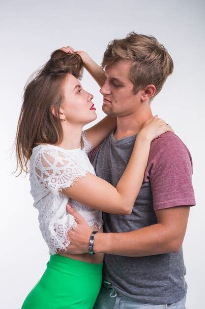 Premium Photo Young Couple Hugging With Passion
