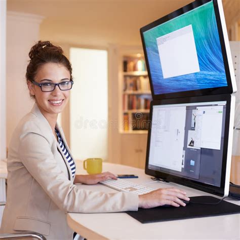 Have You Made The Upgrade To Dual Screen Portrait Of A Young Woman Working On A Dual Screen