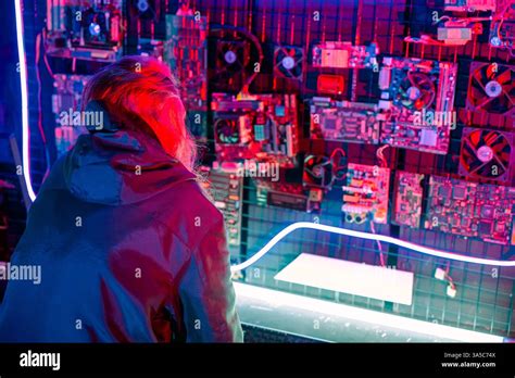 Asian Woman Wearing A Black Jacket Hacking Programming System Check
