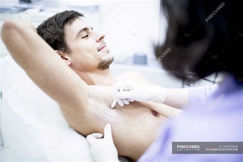 Dermatologist Marking On Underarm For Botox Injection — Man Skin Care