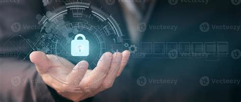 Businessman Holding Padlock Protecting Business And Information Data With Virtual Network