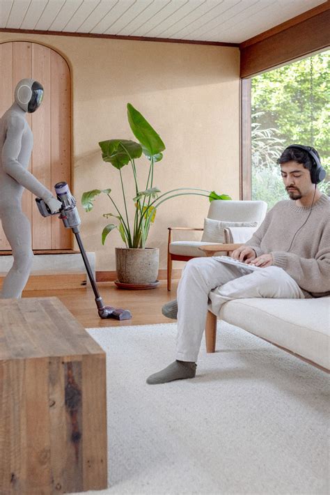 Scandi Robot Servant Neo Gamma Is Dressed Head To Toe In Beige Knitwear