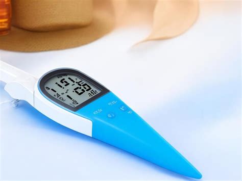 Premium Ai Image Thermometer With High Temperature And Medicine Ai