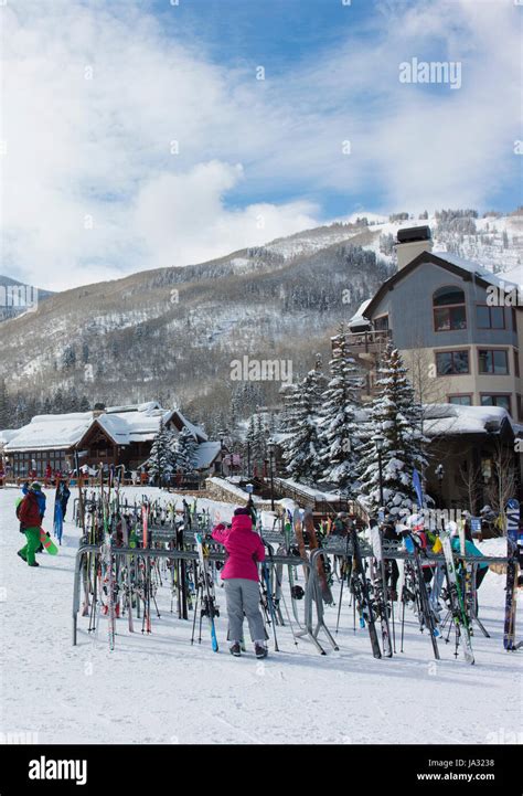 A Skier Attends To Skis At A Rack At Beaver Creek A Ski Resort Near