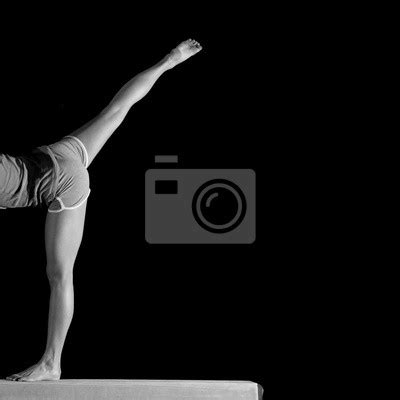 Spread Legs Of Female Gymnast On Balance Beam Posters For The Wall