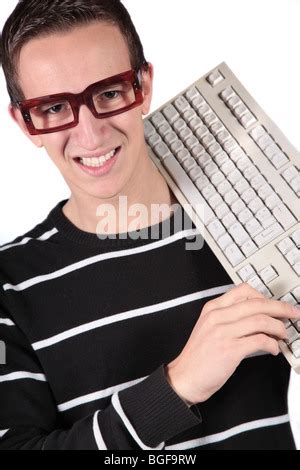 Computer Nerd With Keyboard Isolated On White Stock Photo Alamy