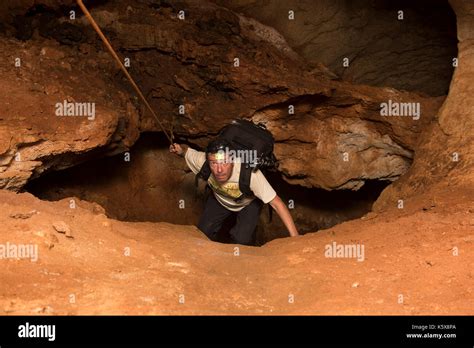 Tourist In Mandresy Cave Carved In Tsingy Of The Ankarana Massif