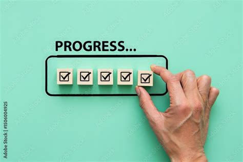 checklist and task progress tracking concept a hand placing the final