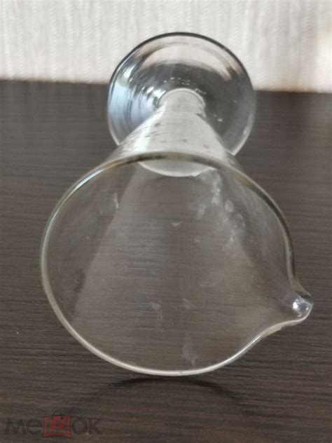 Мерная рюмка.