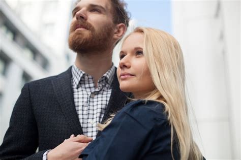 Premium Photo Man And Woman Looking Into The Distance