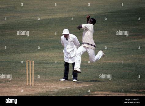 Middlesexs Wayne Daniel Bowls Watched By Umpire Dusty Rhodes Stock