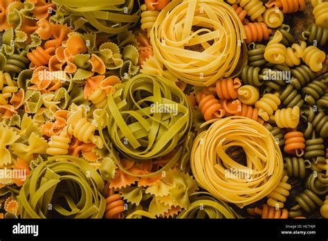 Different Types Of Colored Pasta With Various Shapes Stock Photo Alamy