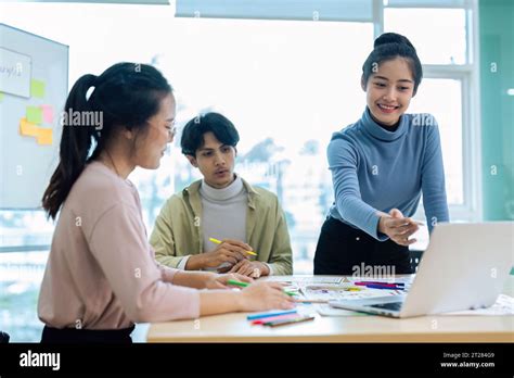 Team Of Ux Developer And Ui Designer Brainstorming Interface Wireframe Design Creative Digital