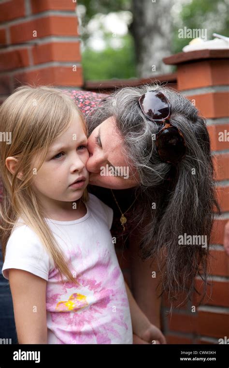 French Mom Trying To Cheer Up Her Daughter With A Loving Kiss Age 8 And 35 Zawady Central