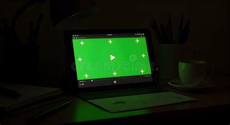 Workstation With Tablet Displaying Green Screen For Customizable Content Integration Stock