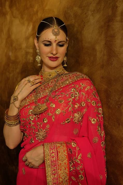 Beautiful Young Woman In Traditional Indian Clothing With Bridal Makeup