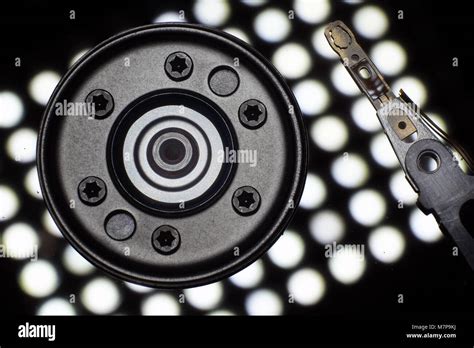 Internal View Of Computer Laptop Hard Drive Showing Read Write Head And Magnetic Disk Stock
