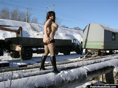 Busty Sexpot Flashes Her Knockers Pussy And Ass In The Snowy Street