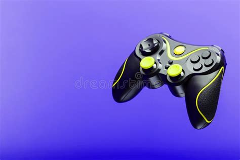 Controller With Purple Lit Keyboard Amidst Various Wireless Devices