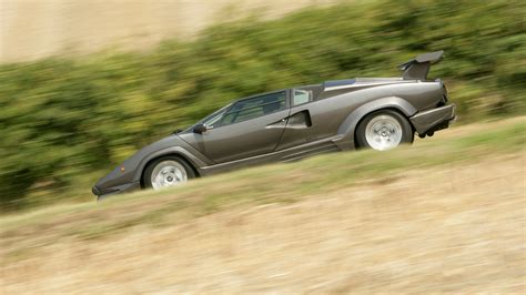 15 Cool Classic Cars With Massive Wings Classic And Sports Car