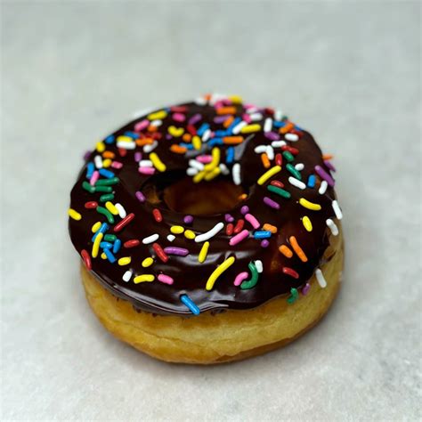 Chocolate Glazed Donuts With Sprinkles House Of Donuts