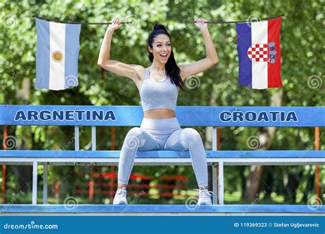 Flags Of Argentina And Croatia Being Held By Beautiful Girl Stock Image